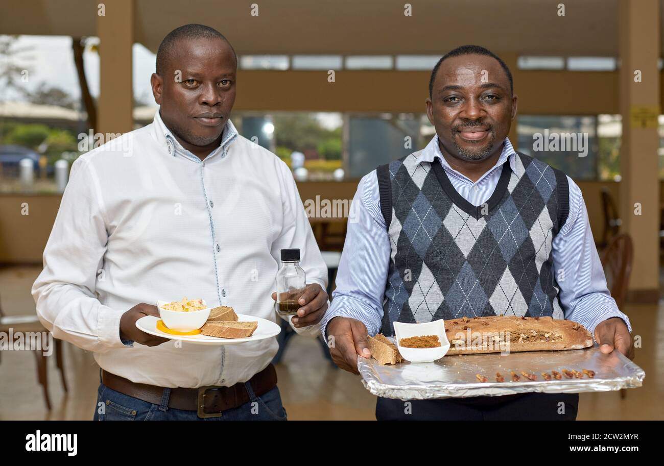 Nairobi, Kenya. 07th Aug, 2020. Insect researchers Xavier Cheseto (l ...