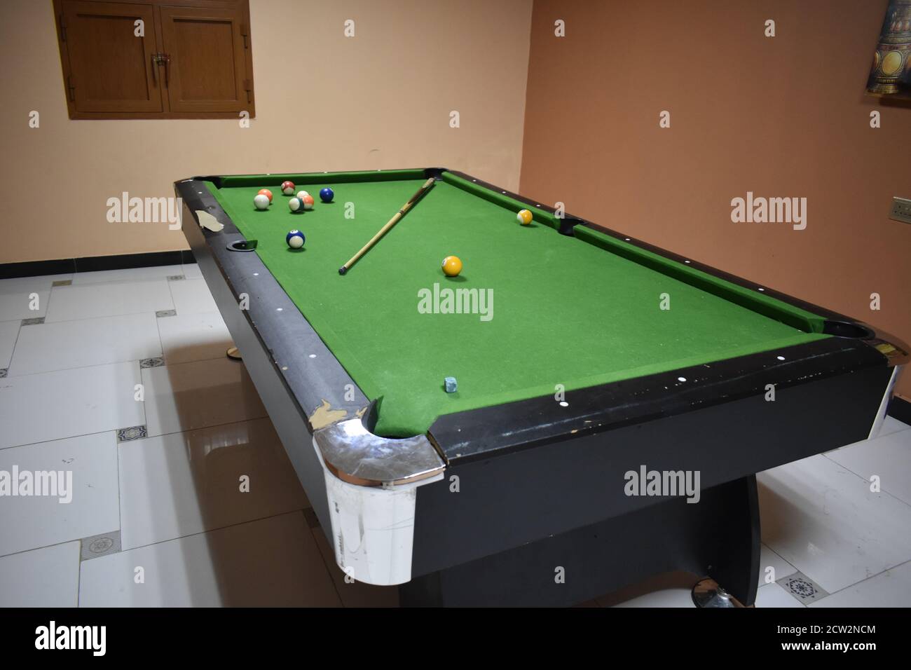 billiard table with cue and balls. Green billiards background Stock ...