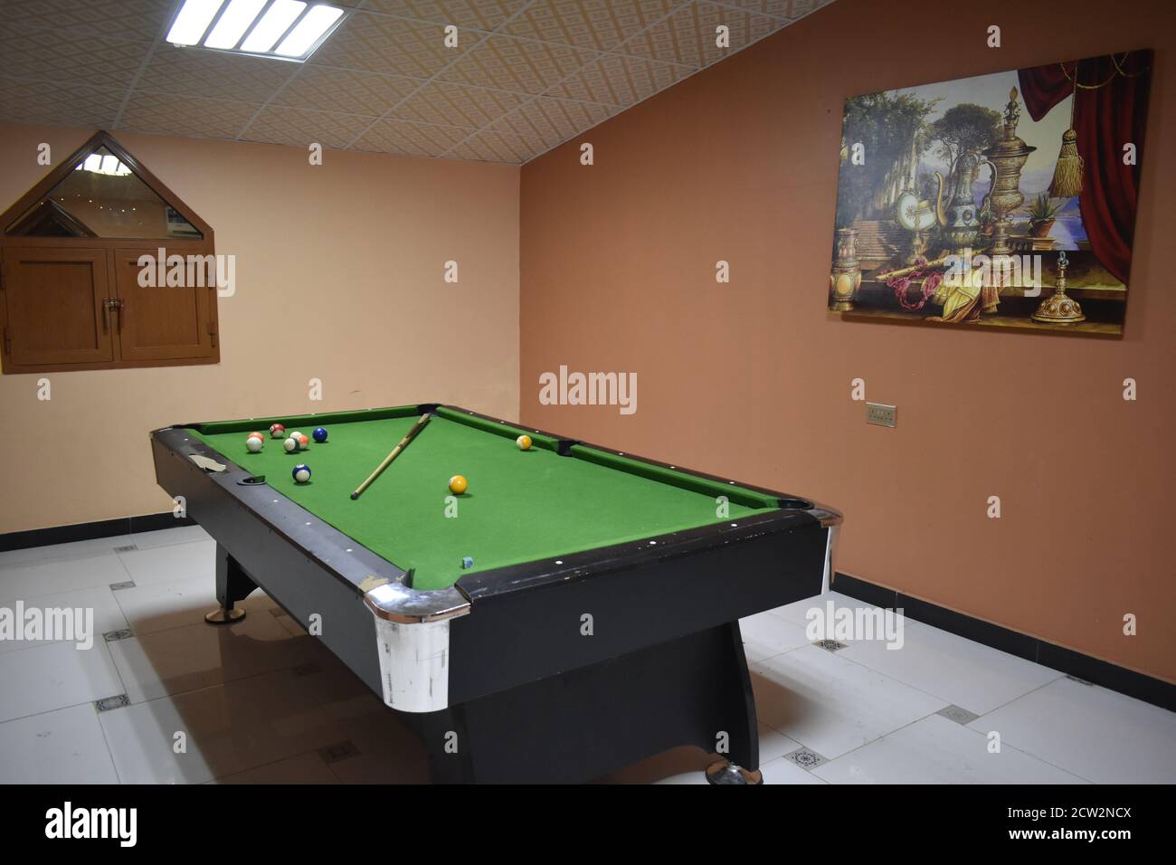 billiard table with cue and balls. Green billiards background Stock ...