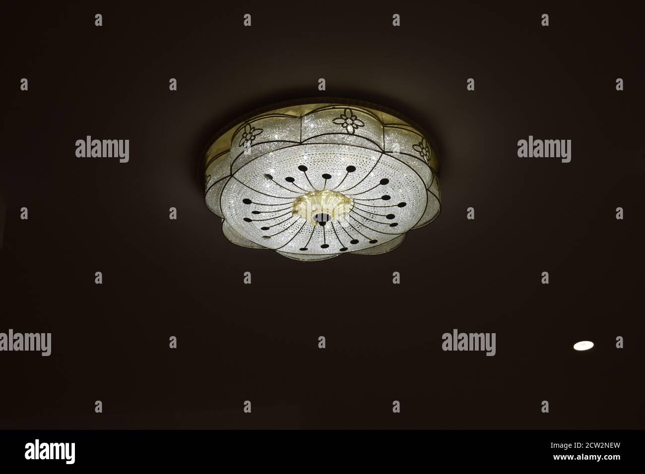 Round drop ceiling with lamps / lighting fixtures. Modern interior ...