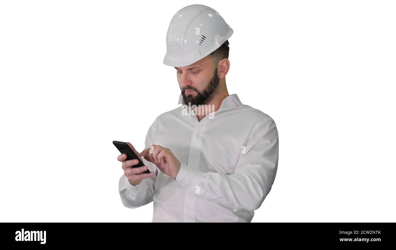 Smart engineer in white shirt and safety engineering hat using s Stock ...