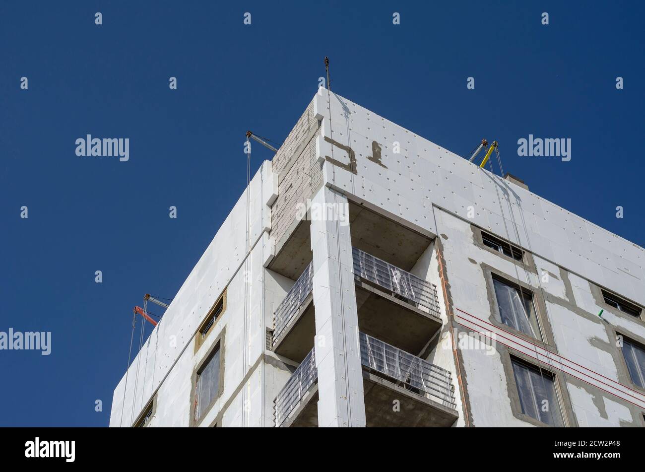 Fragment of the roof of an unfinished apartment building against the ...