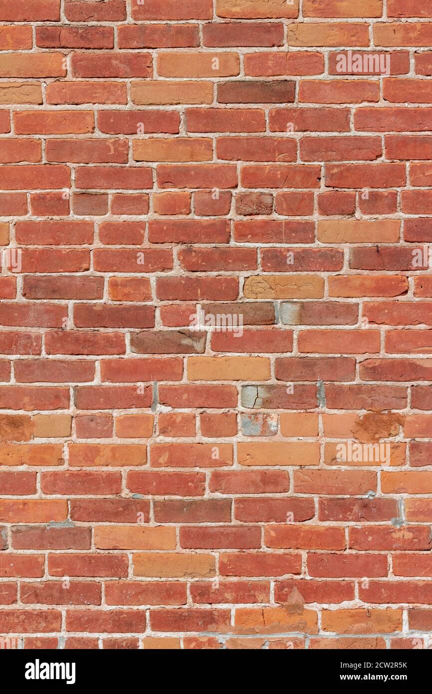 Antique red and brown clay brick wall texture background in common bond ...