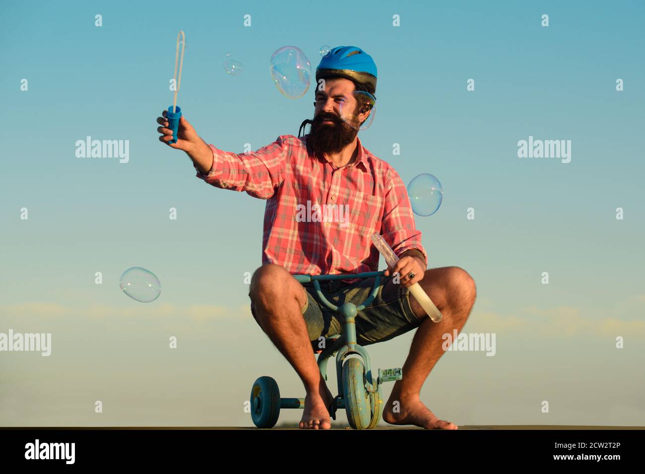 Funny bicycle rider. Comic man ride bike. Funny biker. Guy riding a ...