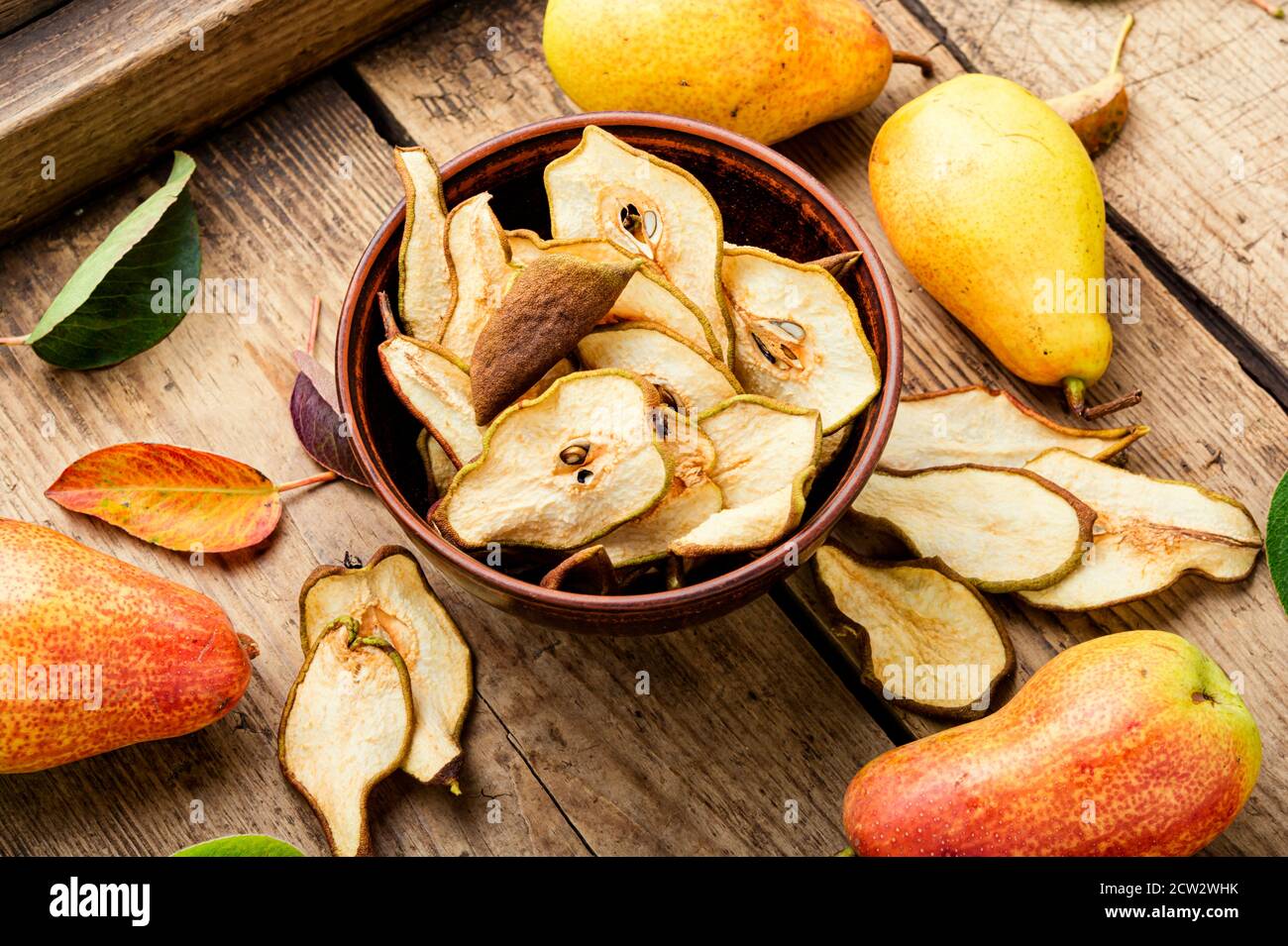 Homemade slices of dried pears.Dried pear or pear chips.Dried fruits ...