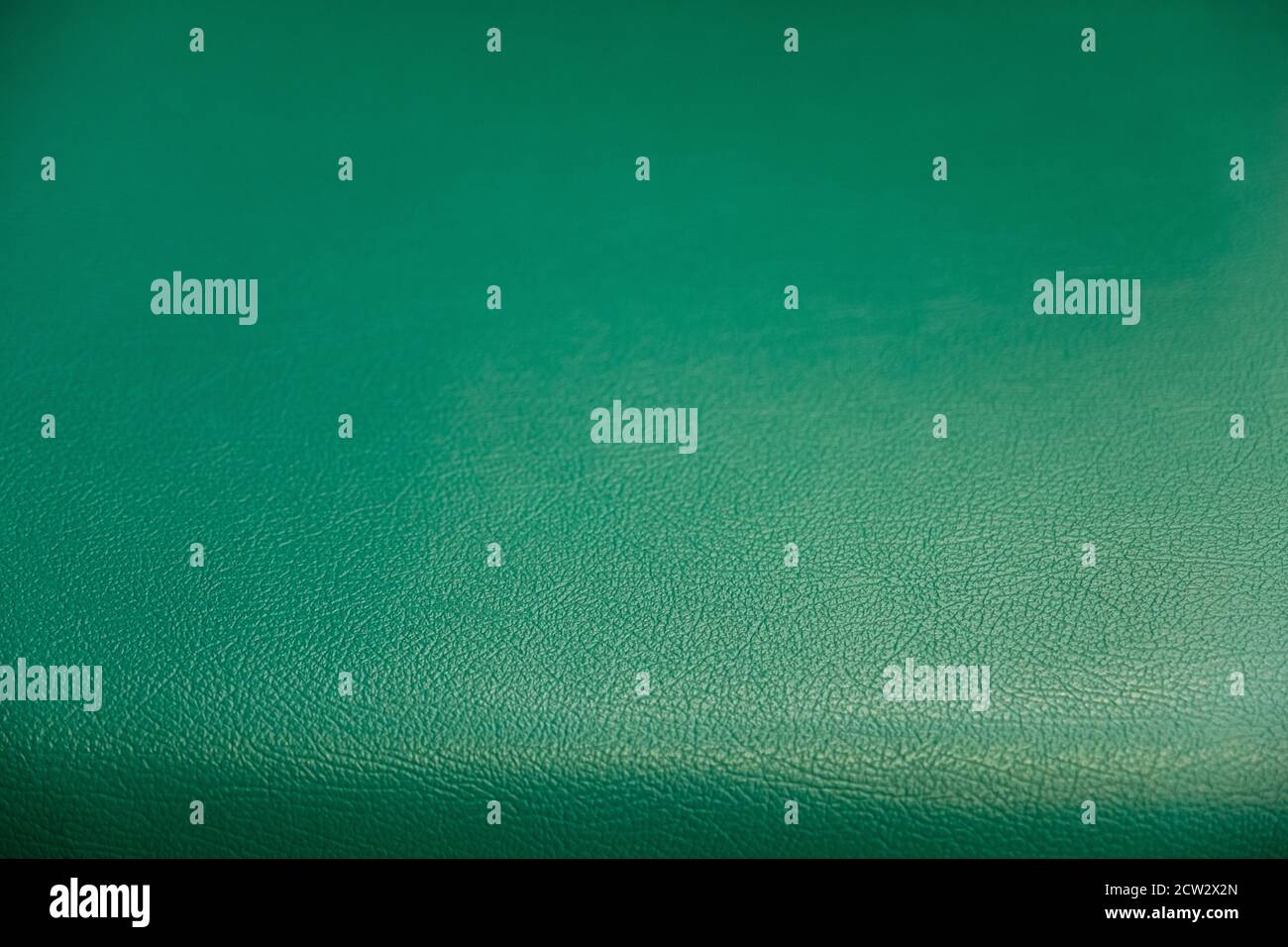 Surface pattern of green synthetic leather textured background, A ...