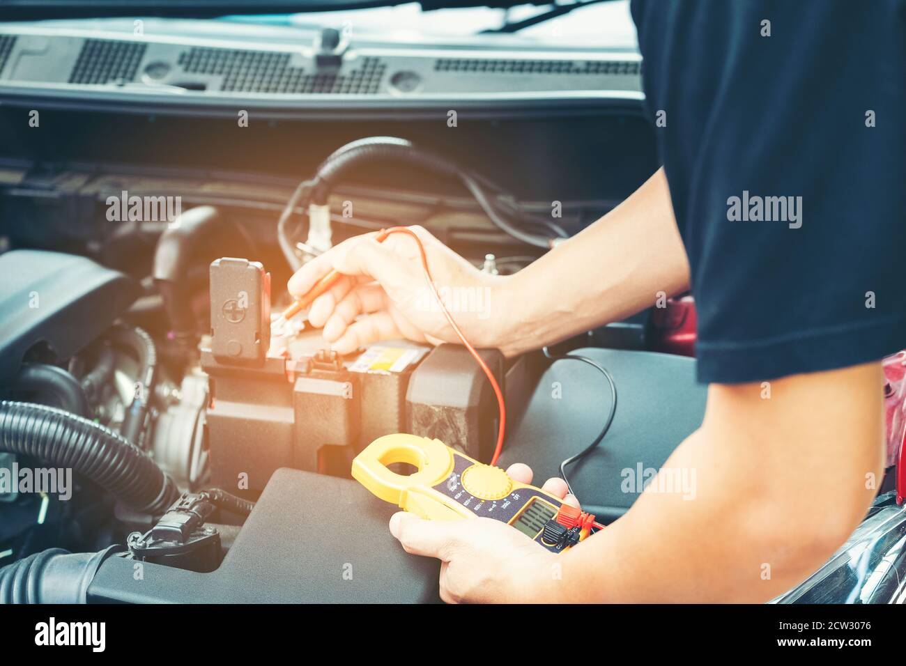 Mechanic working on electric car hi-res stock photography and images ...