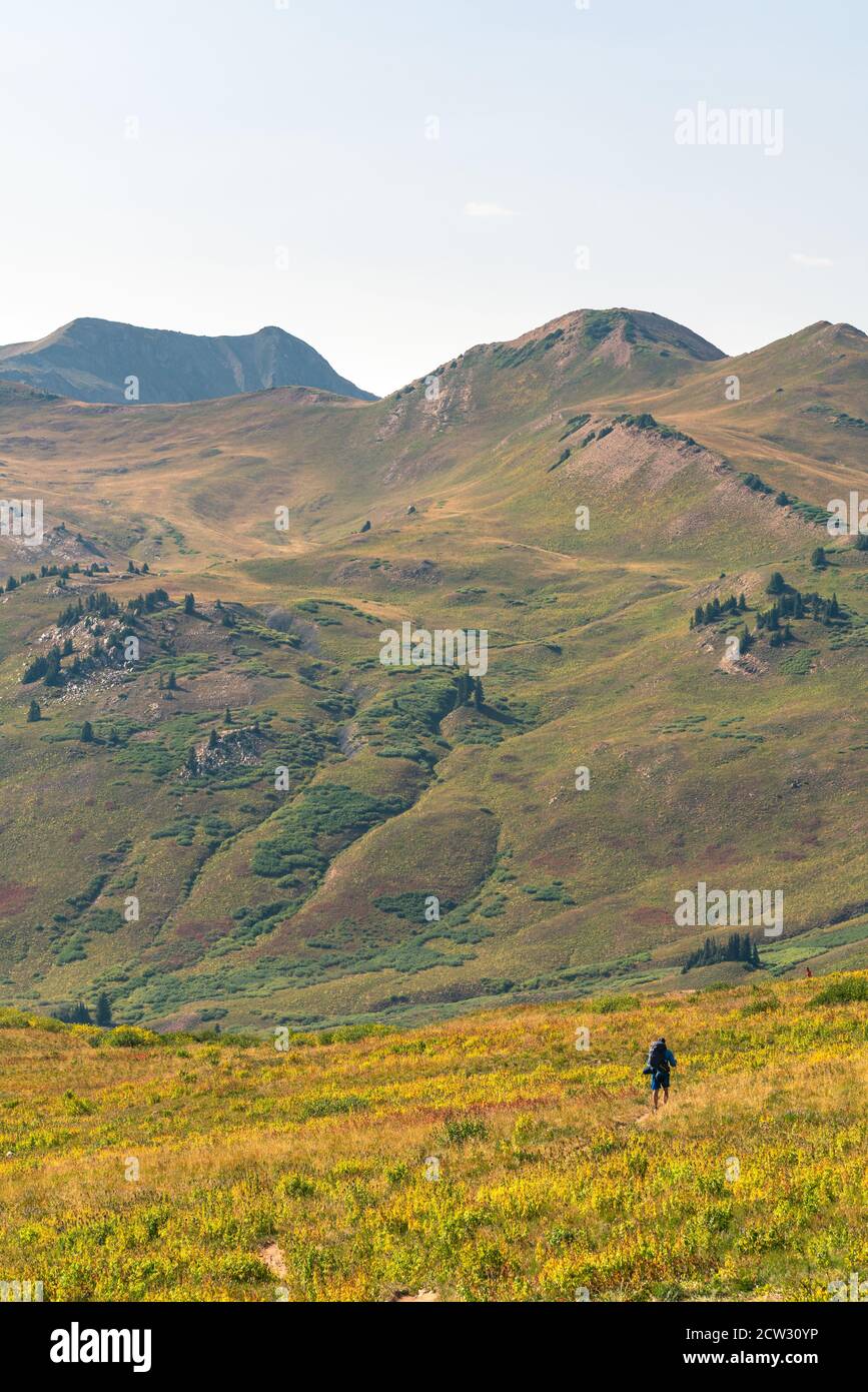 Hiker backpacking on the Four Pass Loop Trail near Aspen, Colorado ...
