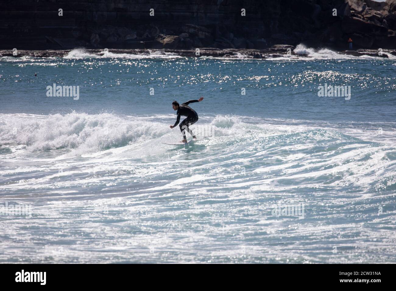 Australian man surfing in the ocean at Avalon beach in Sydney,NSW ...