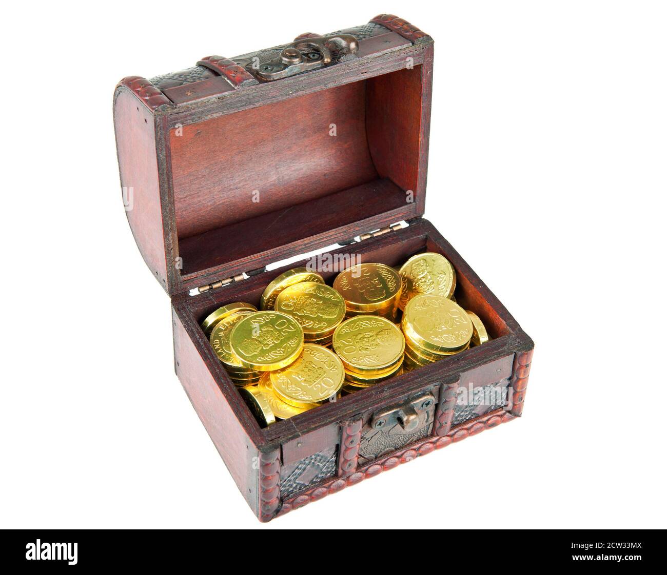Very old treasure chest full of golden coins on a white background ...