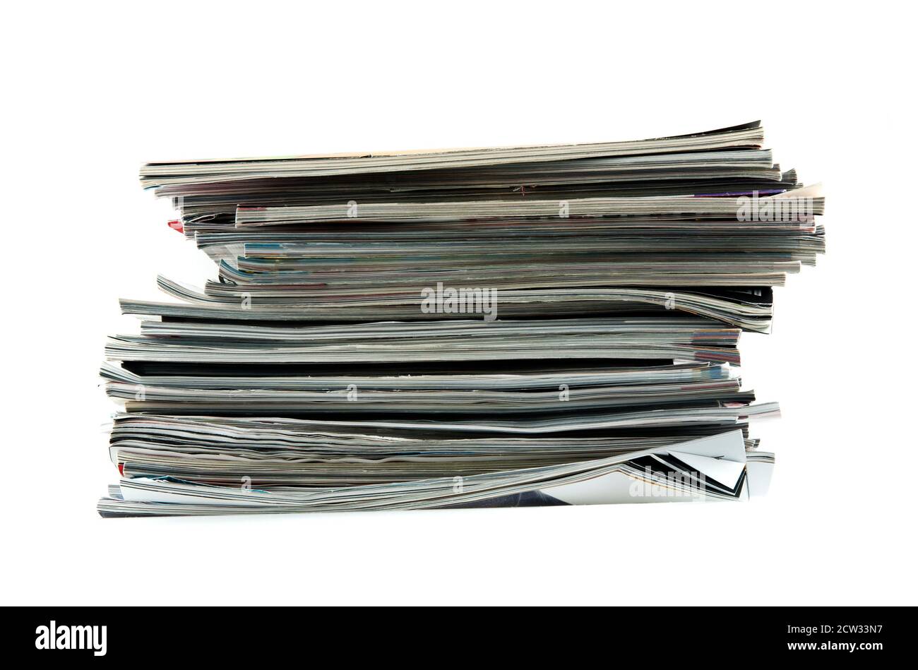 Stack of magazines isolated on a white background Stock Photo - Alamy