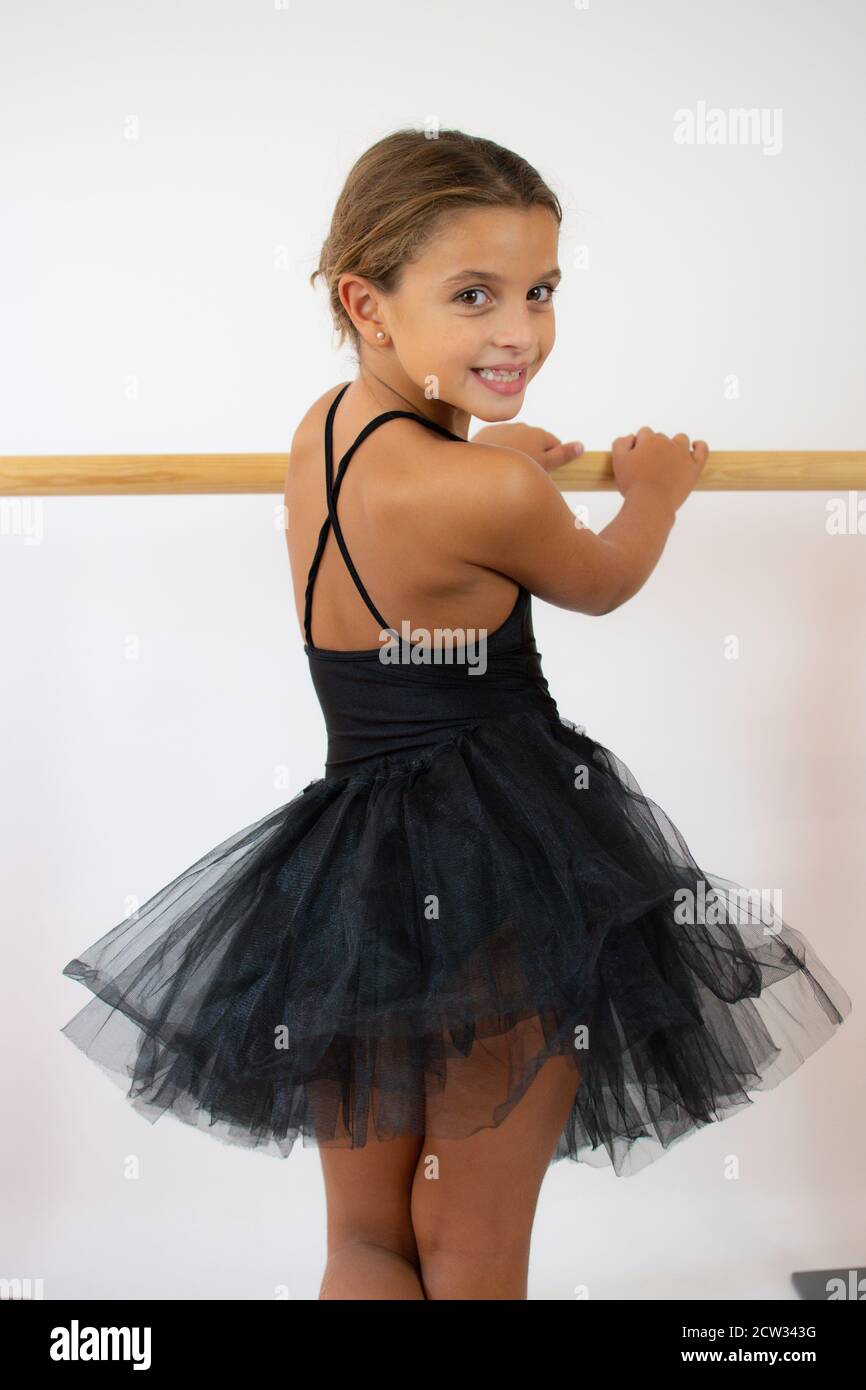 Beautiful little ballerina on white background Stock Photo - Alamy
