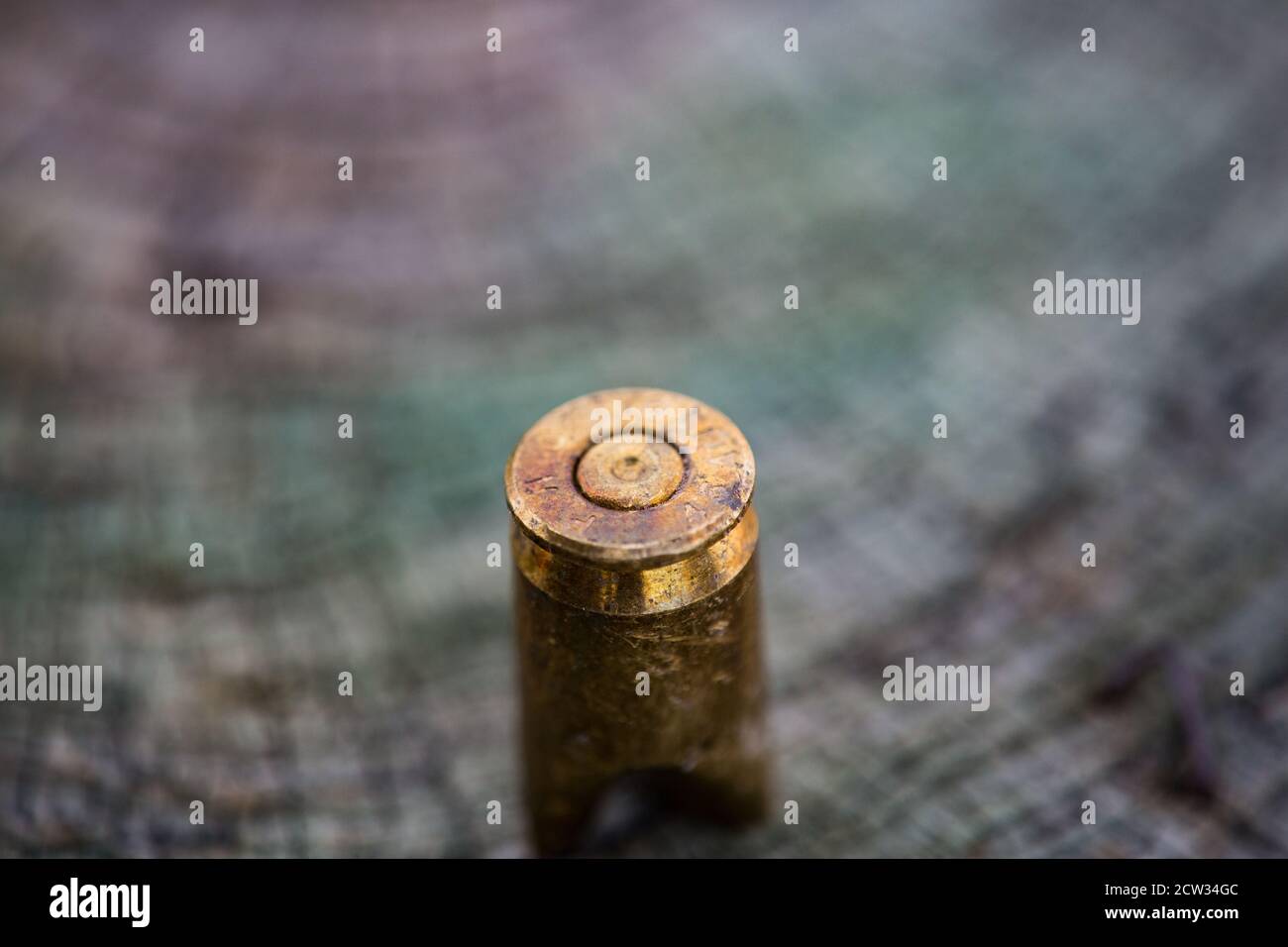 bullet casing abandoned on the ground Stock Photo - Alamy