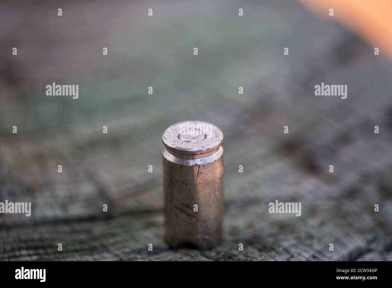 bullet casing abandoned on the ground Stock Photo - Alamy
