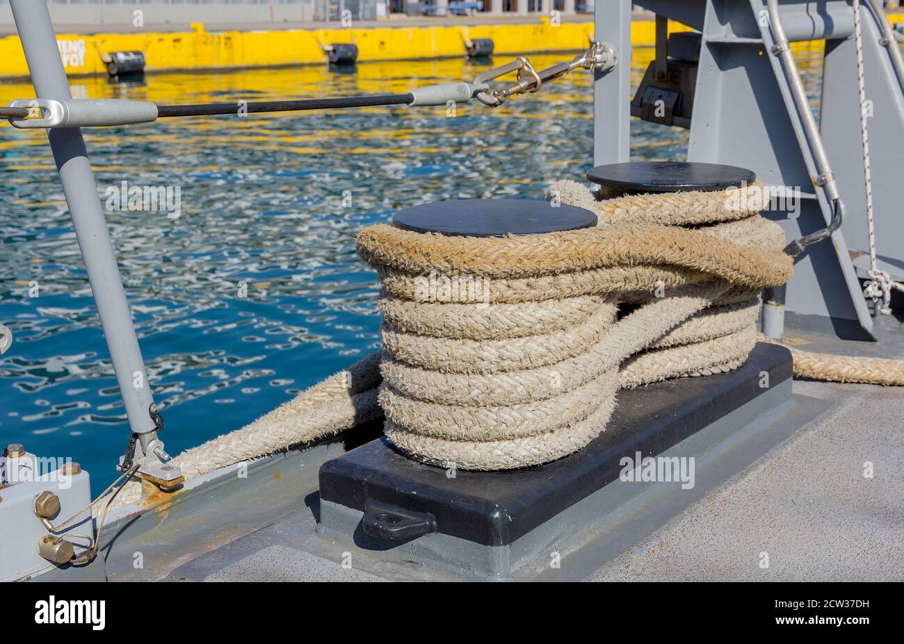 Bollard with ropes on a ship Stock Photo - Alamy