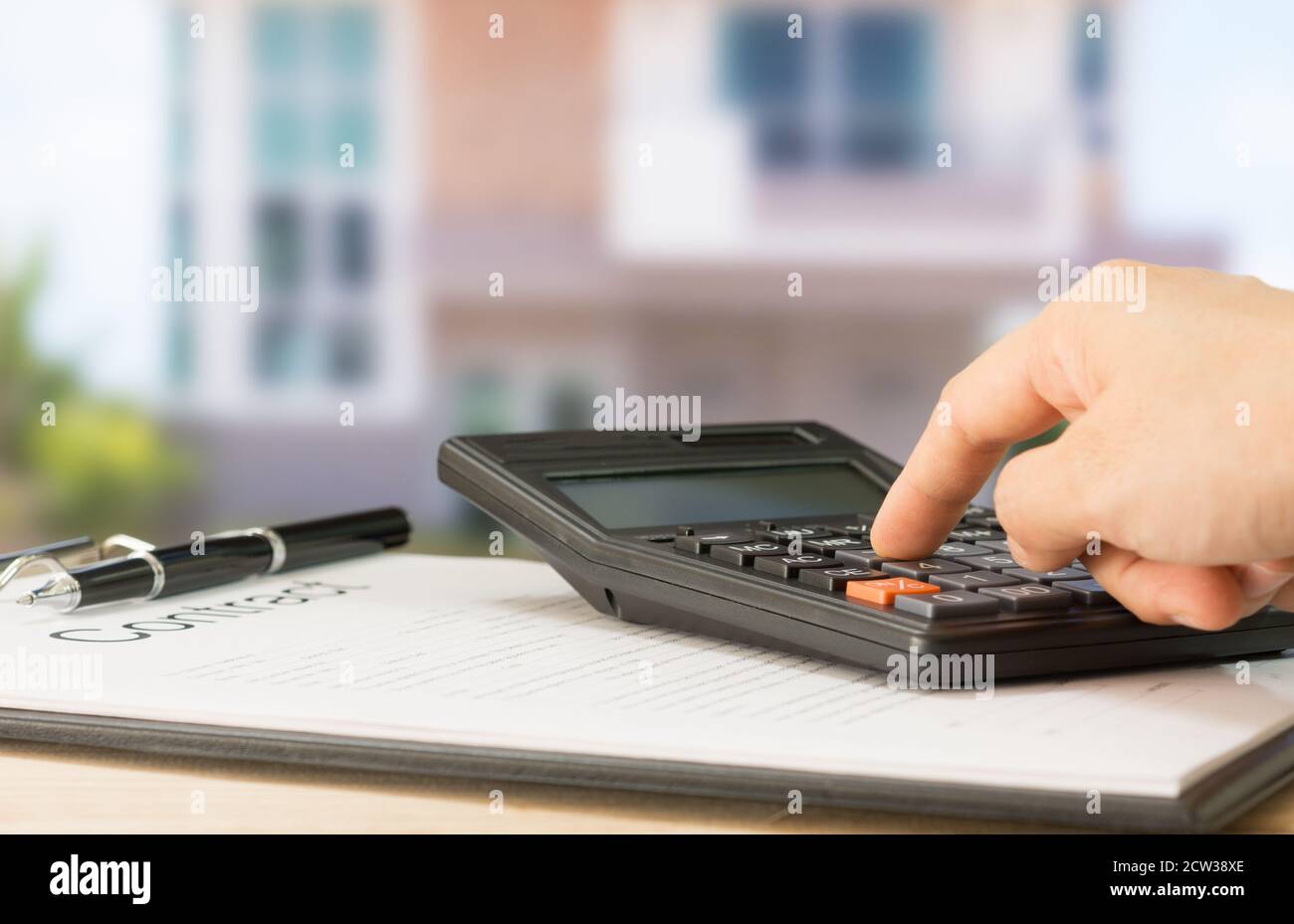 Contractor making calculations estimated construction cost before to ...