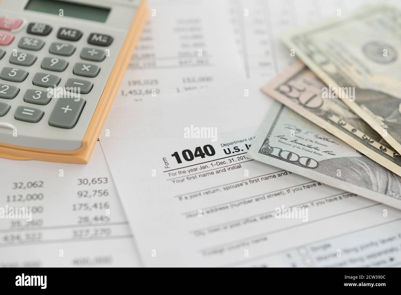 U.S. Individual Income Tax Return - 1040 tax form and calculator, money ...