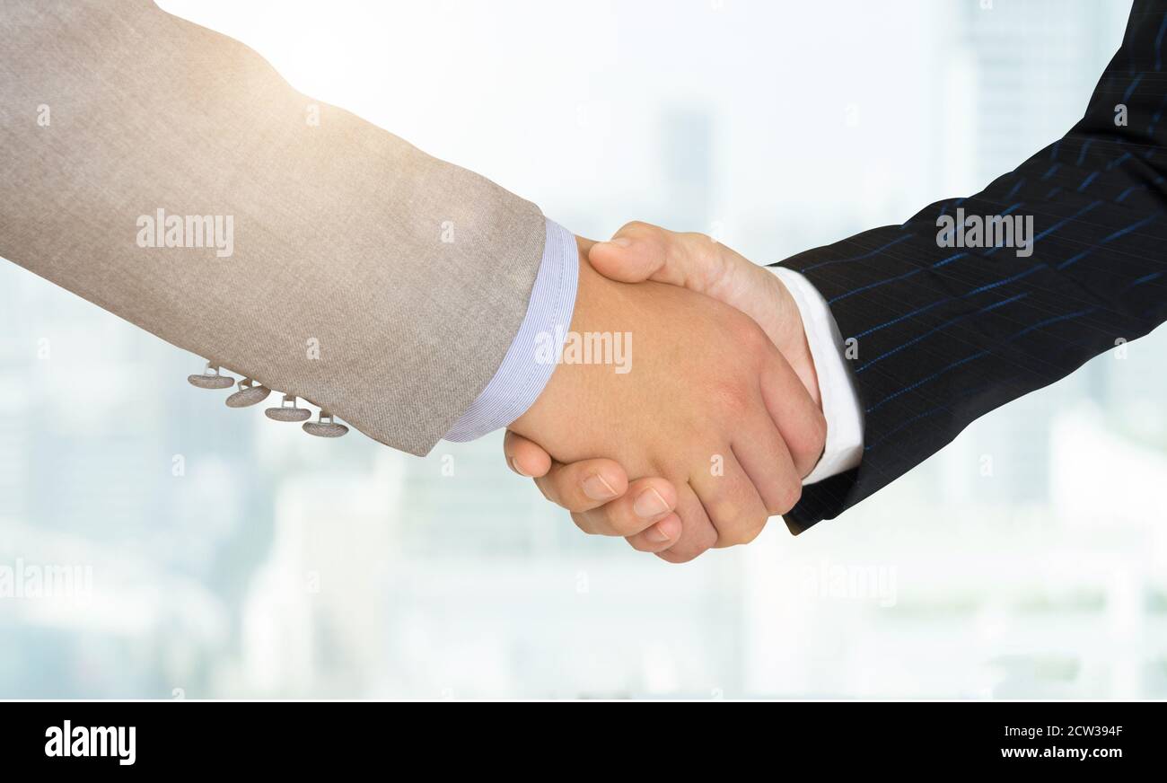 Business People Handshake Greeting ,Dealing, Merger and Acquisition ...