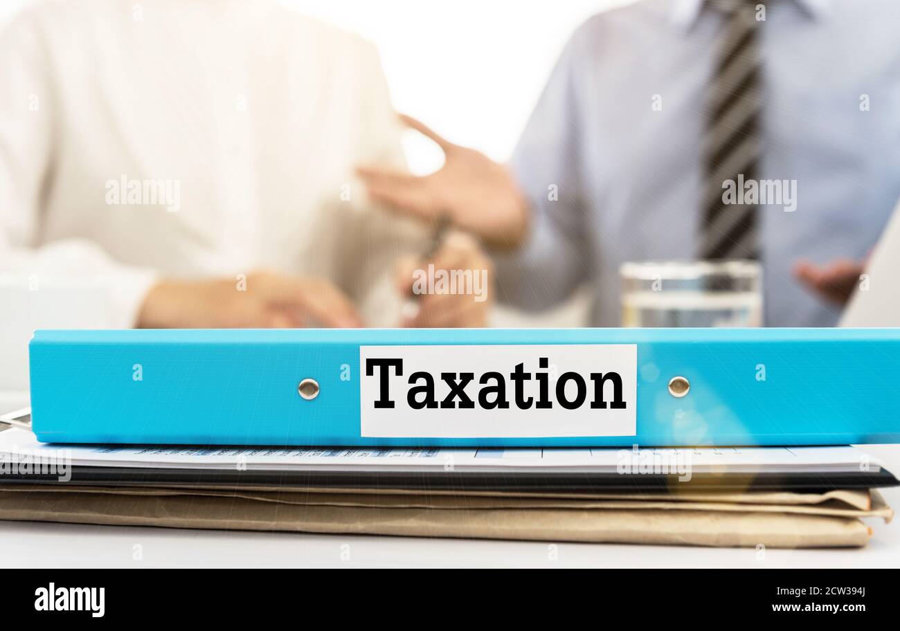 Taxation document folder on desk in meeting room with irs auditor team are discuss Stock Photo ...