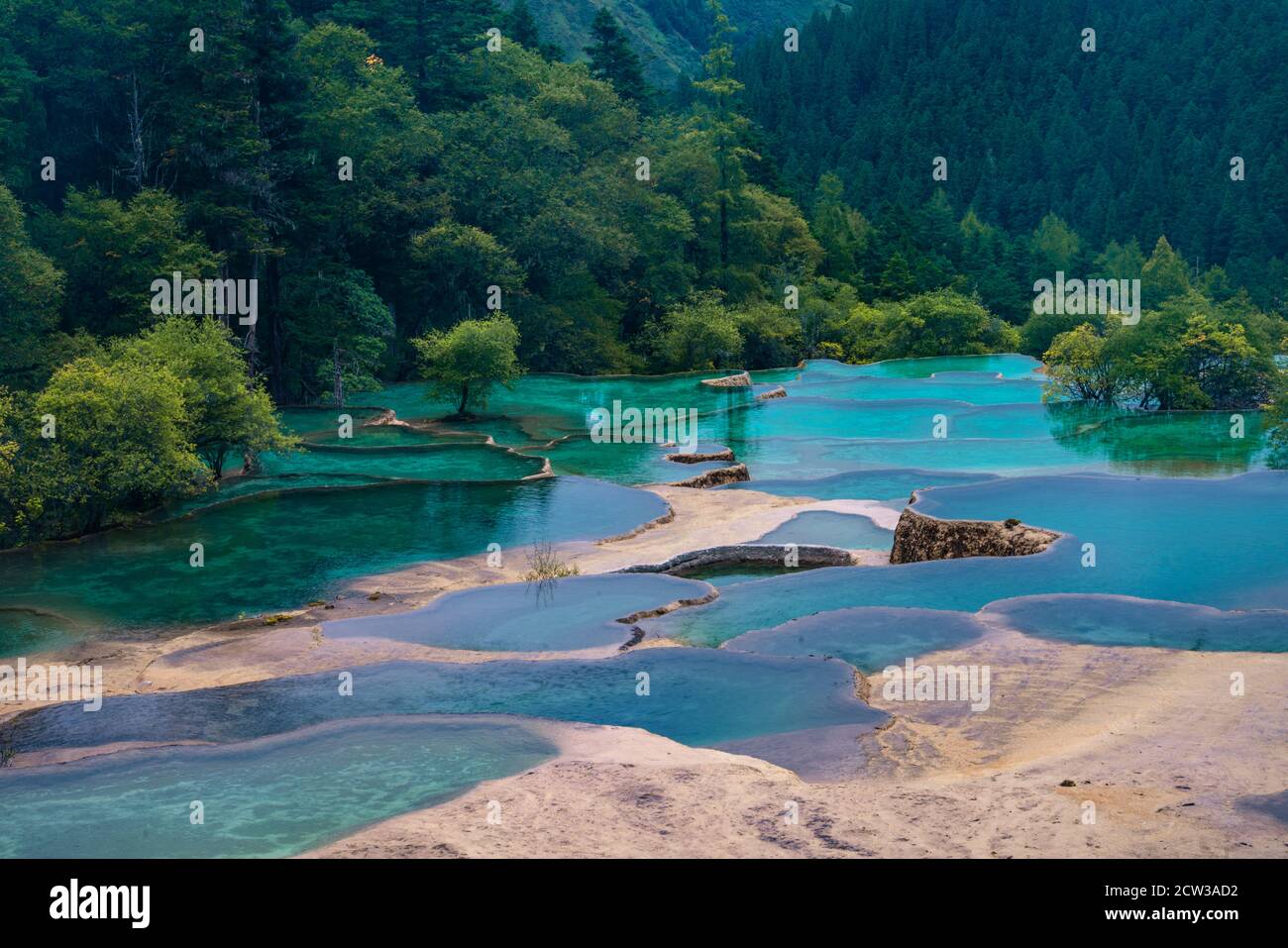 The turquoise color pools in Huanglong Valley, in Sichuan province ...