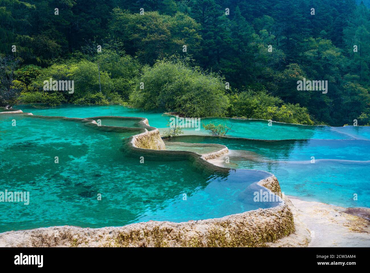 The turquoise color pools in Huanglong Valley, in Sichuan province ...