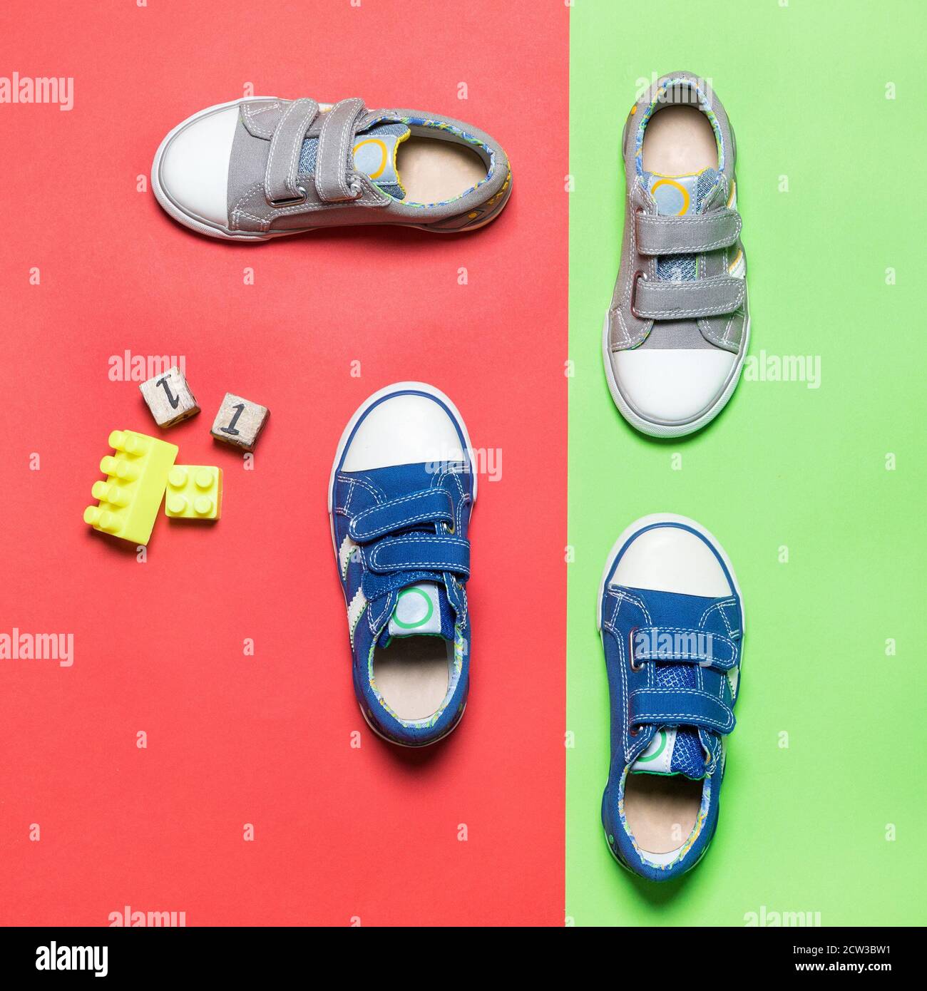 Child sport shoes on colorful background top view Stock Photo - Alamy