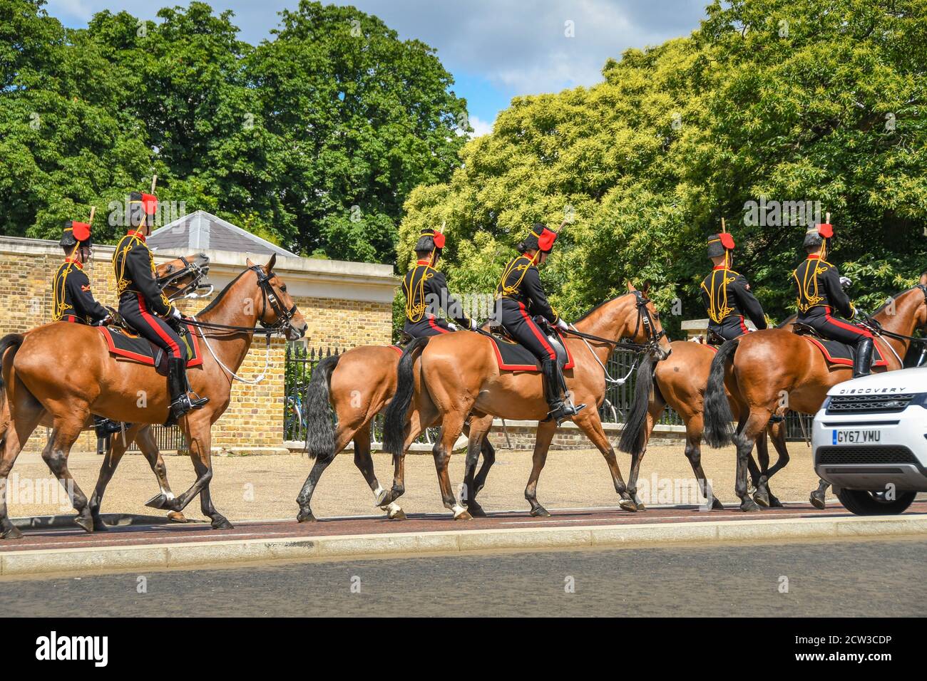 London, England - July 2018: Cavalry soldiers on horseback riding on a ...