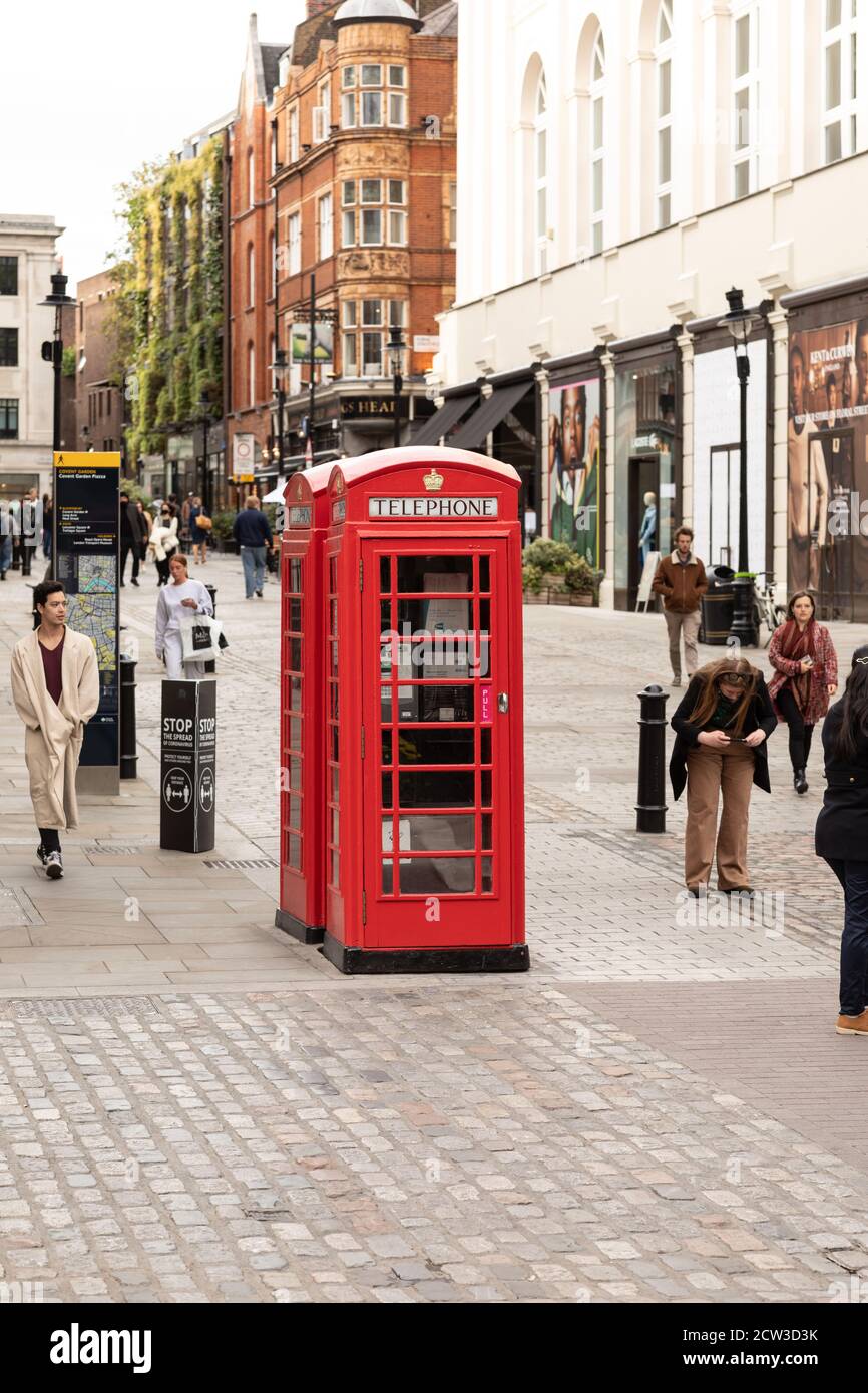 London Covent Garden Telephone Booths Covid Signs and Buses Stock Photo ...