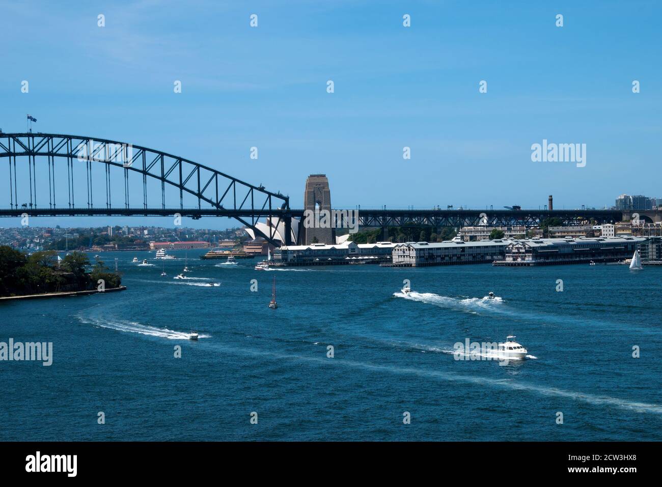 Sydney Australia, view from water of of Sydney Harbour Bridge and city ...