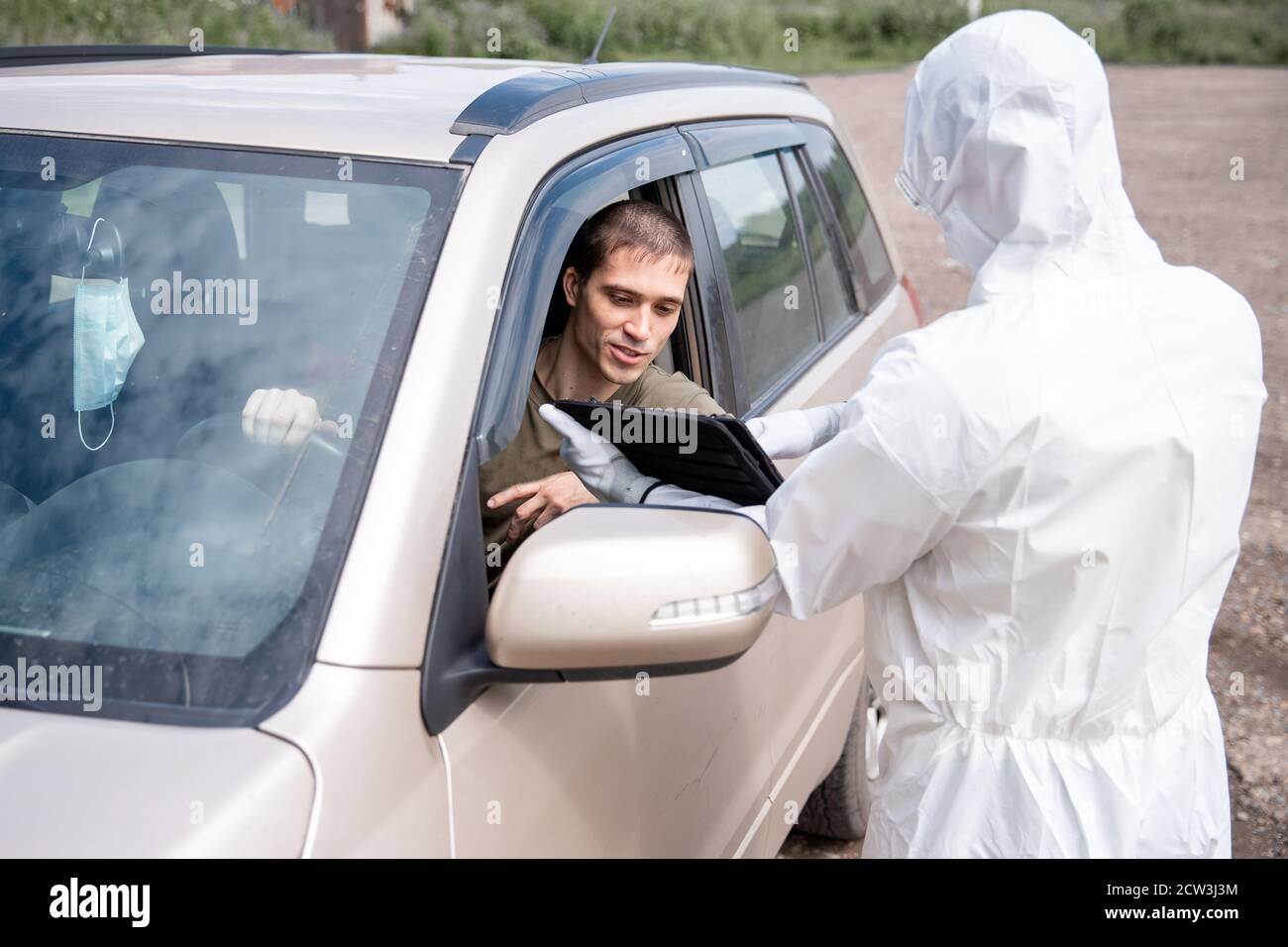 Smear test for COVID-19 coronavirus for driver, restricting movement on ...