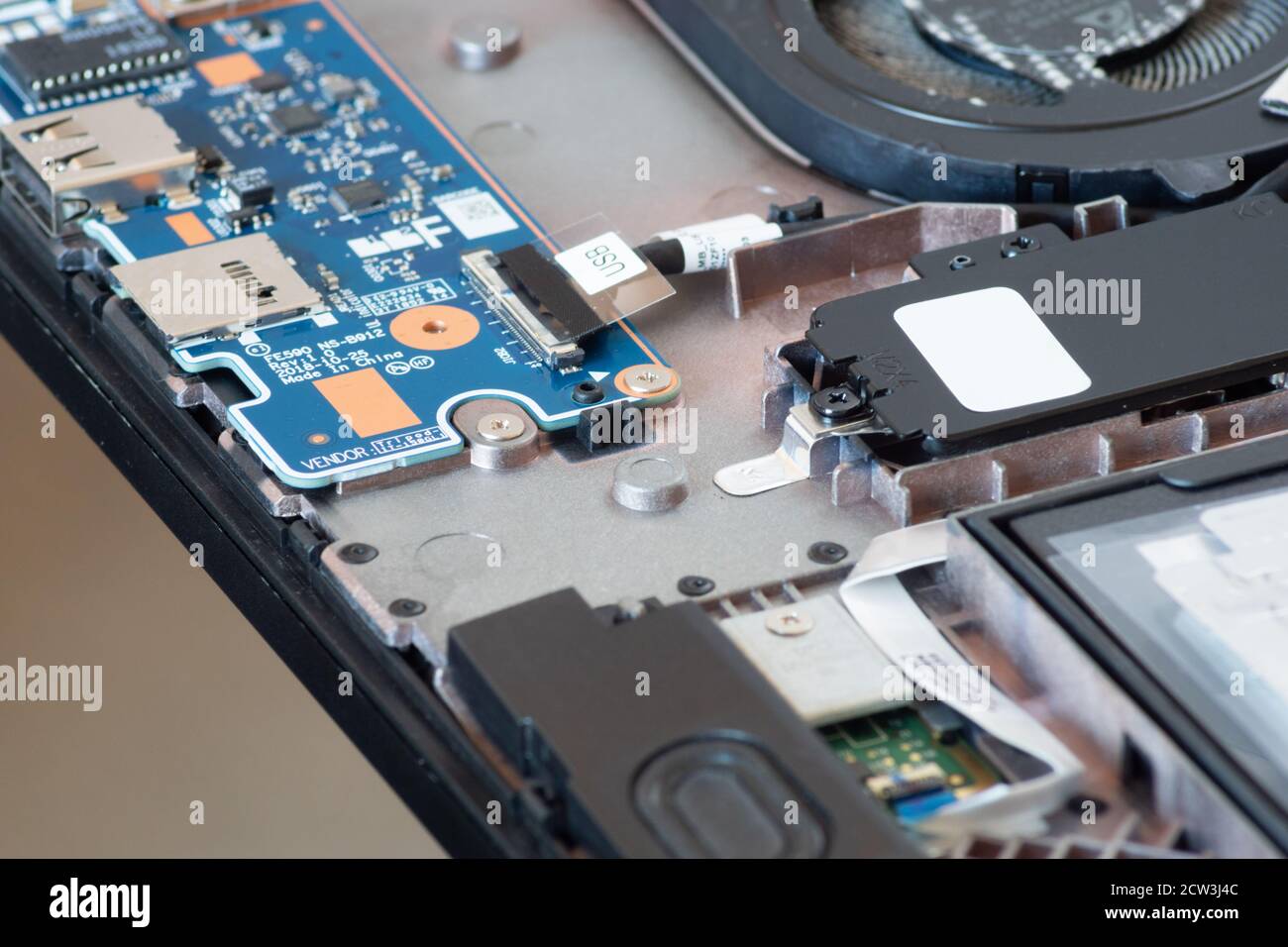 Image depicting an open laptop computer showing the components ...