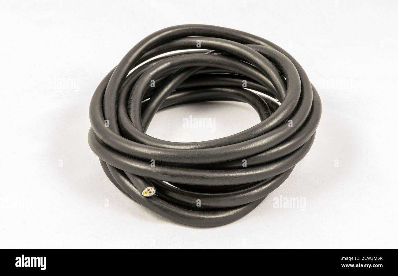Roll of black electric cable isolated on white background Stock Photo ...