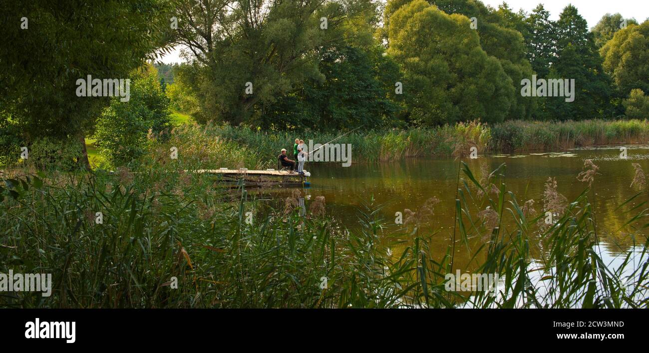 Tree children fishing in hi-res stock photography and images - Alamy