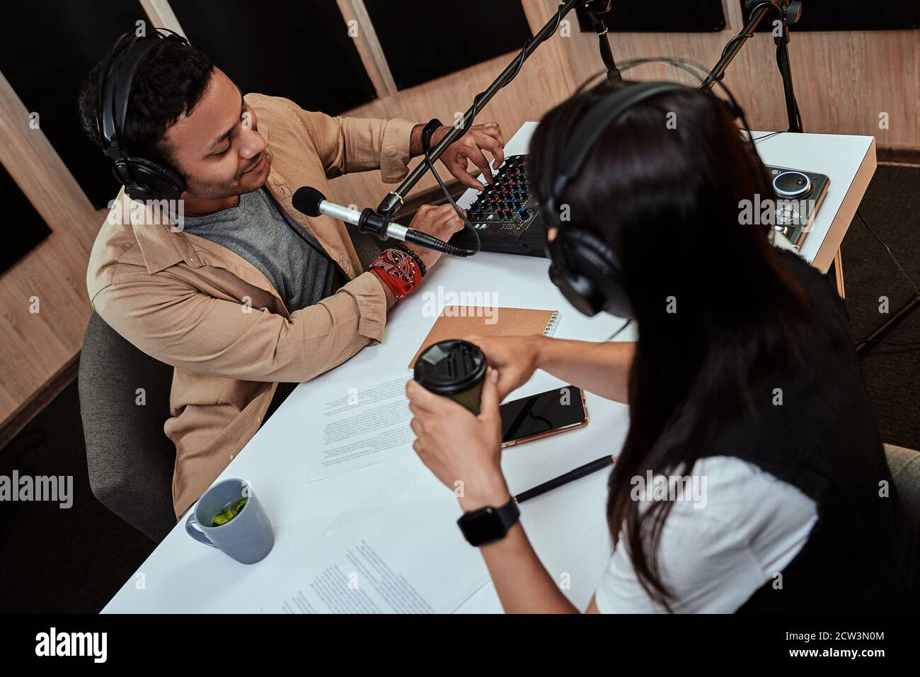 Woman turning a radio hi-res stock photography and images - Alamy