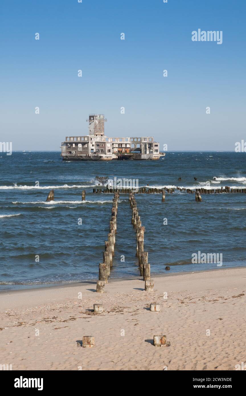 Seascape with ruins of torpedo buildings from second world war Stock ...