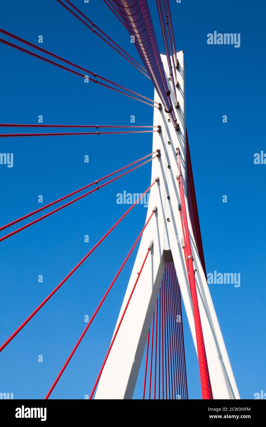 Suspension bridge with cables reaching to the deck of the bridge from ...