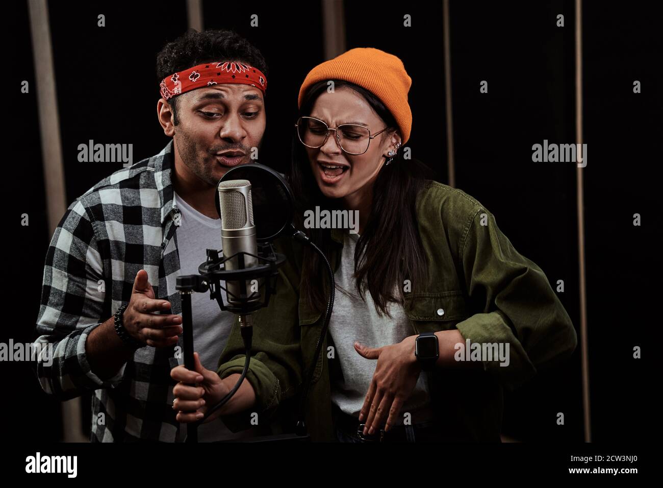 Woman recording vocals condenser microphone hi-res stock photography ...