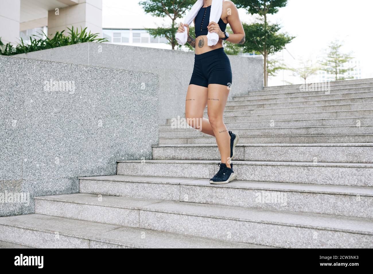 Running sporty woman Stock Photo - Alamy