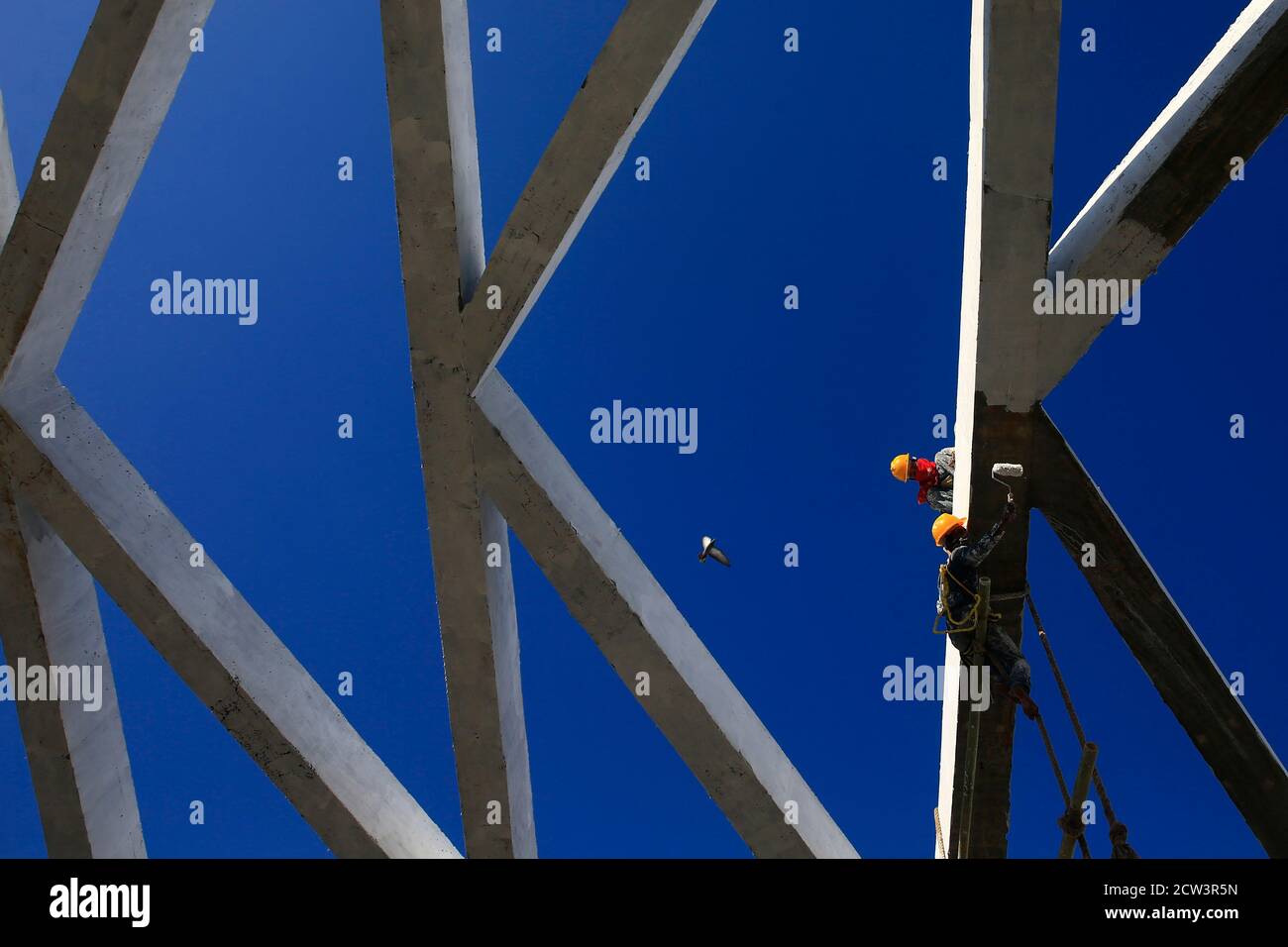 Kathmandu, Nepal. 27th Sep, 2020. Workers paint the newly constructed ...