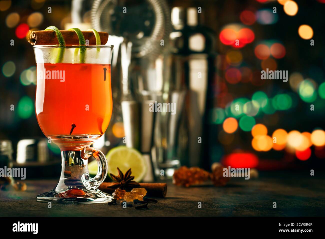 Hot rum punch, grog, autumn or winter warming alcoholic cocktail with ...