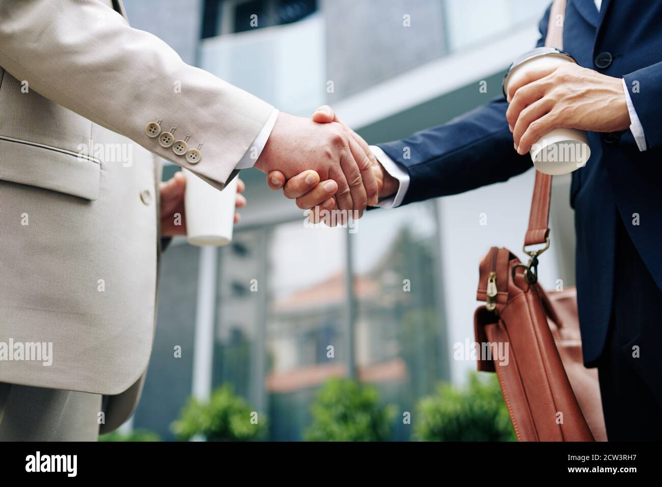 Business people greeting each other Stock Photo - Alamy