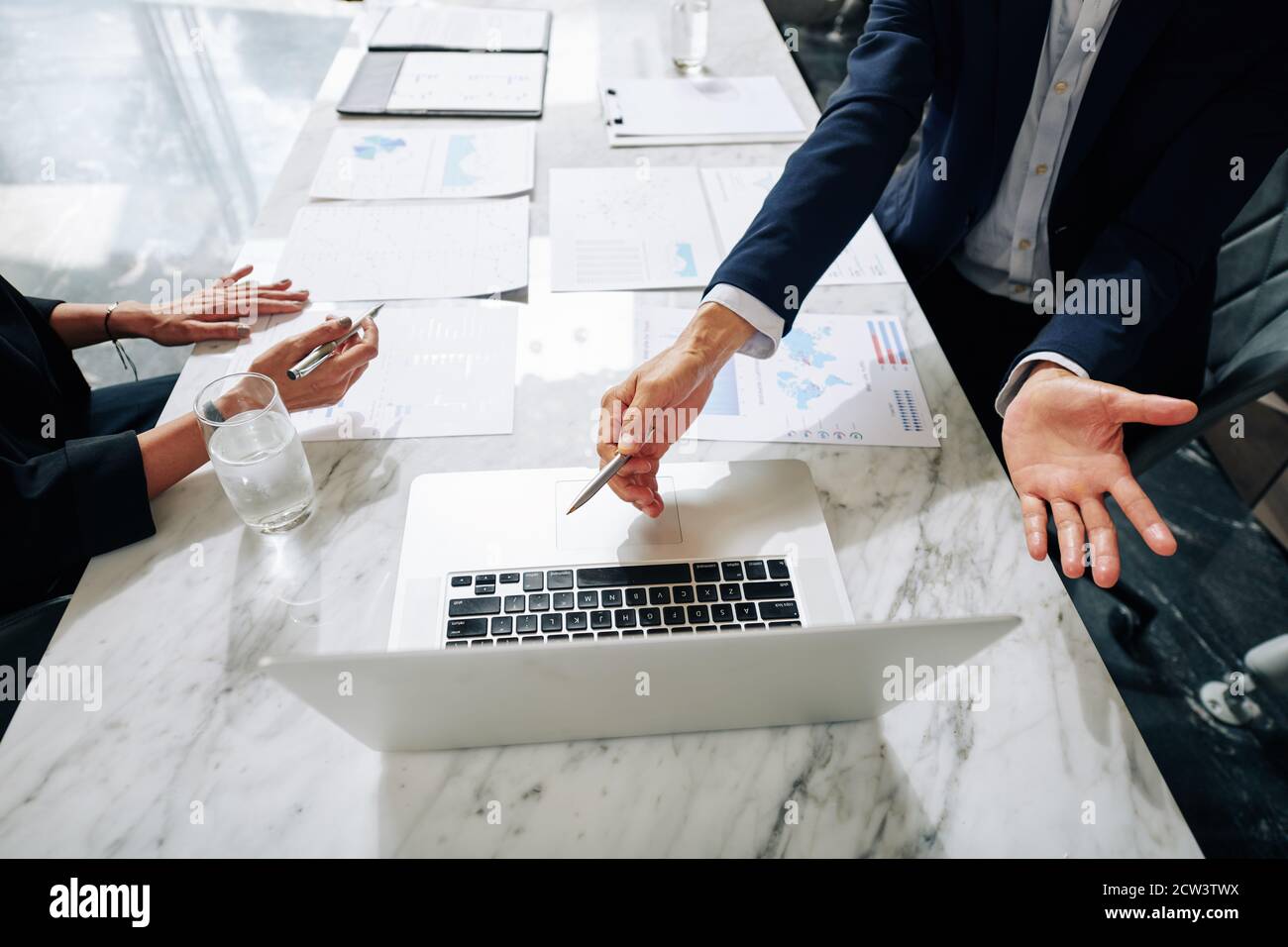 Business people working with report Stock Photo - Alamy