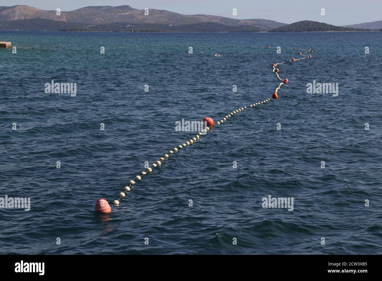 rope with buoys to fence off a safe swimming area on the beach Stock ...