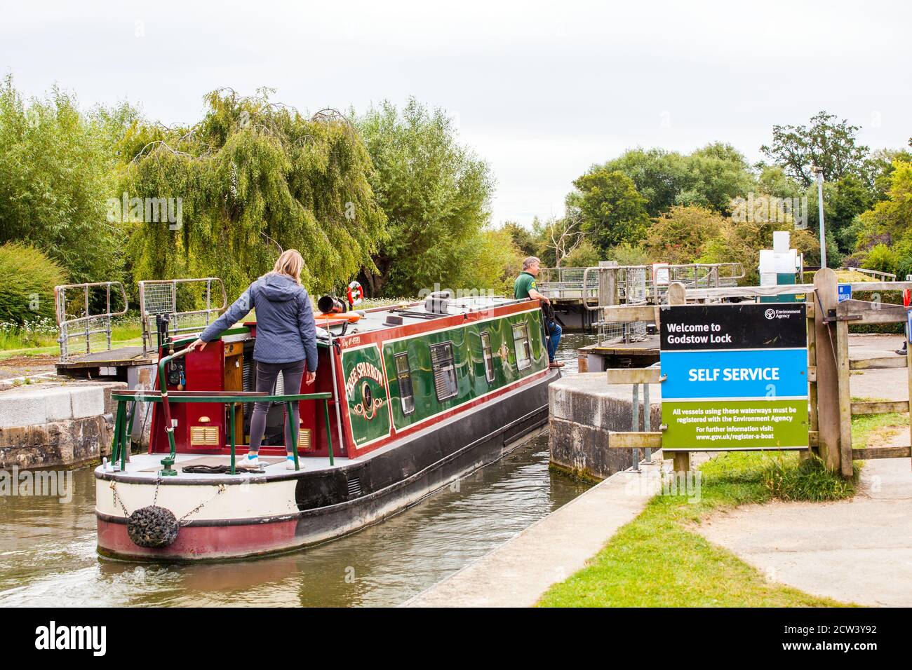Canal narrowboat passing through Godstow self service locks on the ...