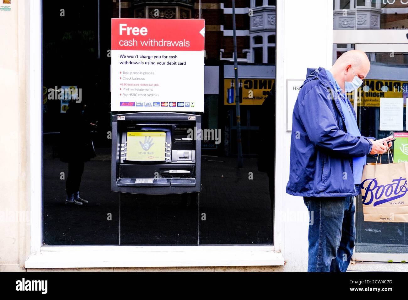 Atm london man hi-res stock photography and images - Alamy