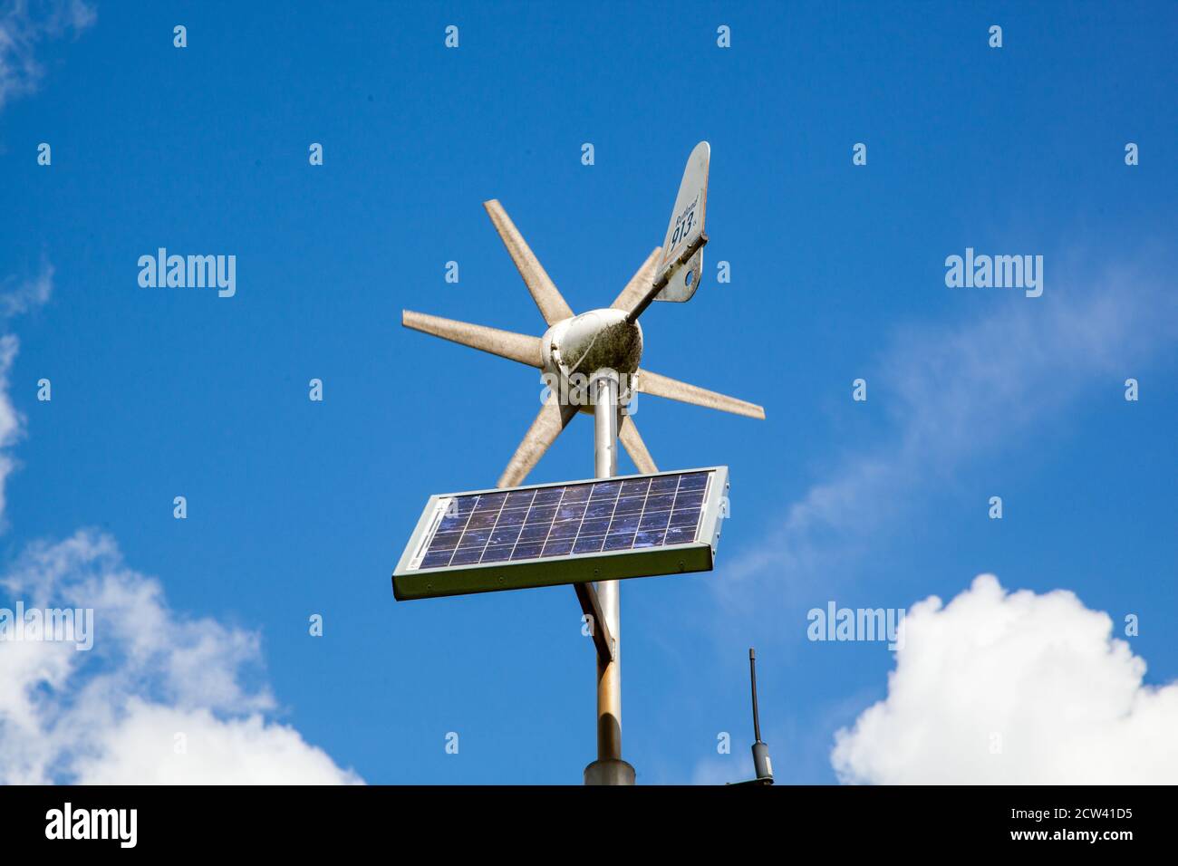 Wind turbine and solar panel combined to provide electricity on a small ...