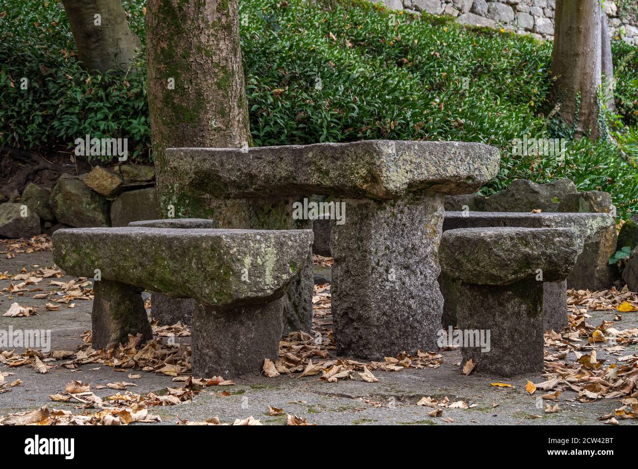 Medieval stone table and benches at the park Stock Photo - Alamy