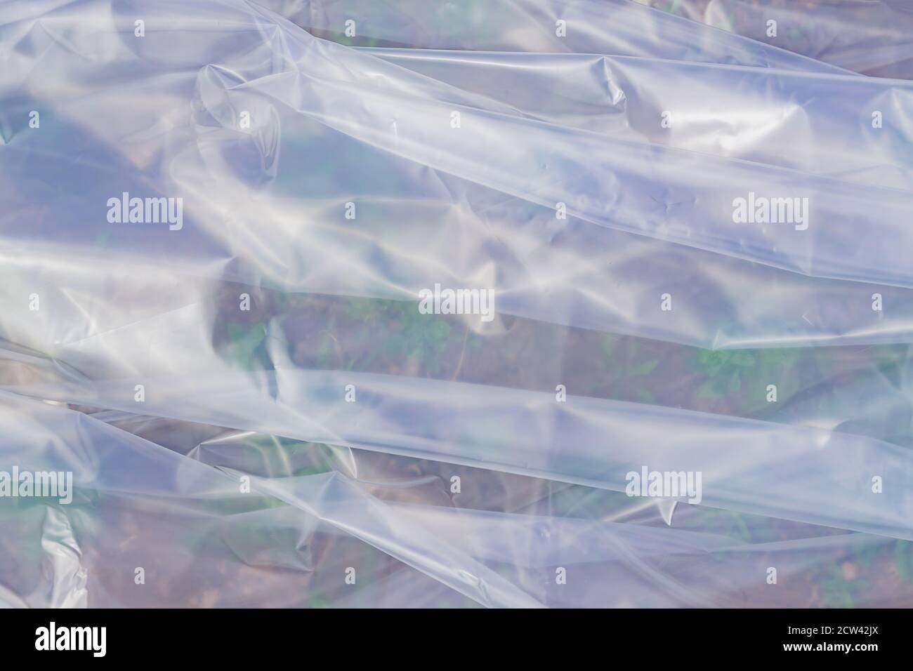 The texture of the transparent polyethylene package. a surface covered ...