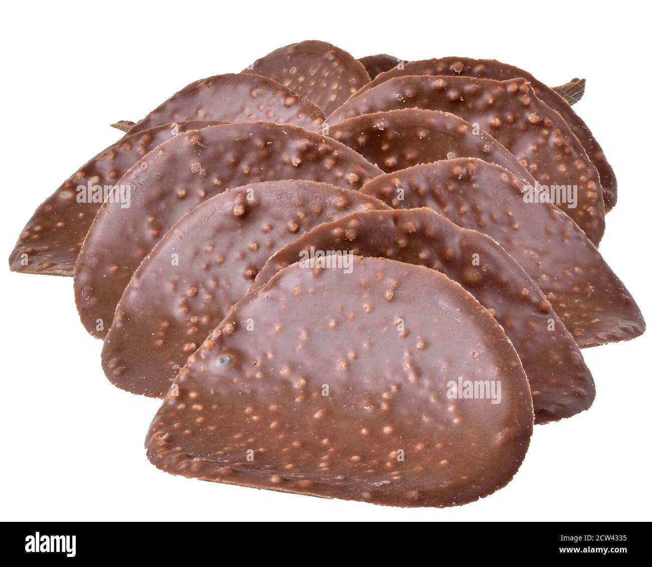 Chocolate chips close up isolated on white background Stock Photo - Alamy