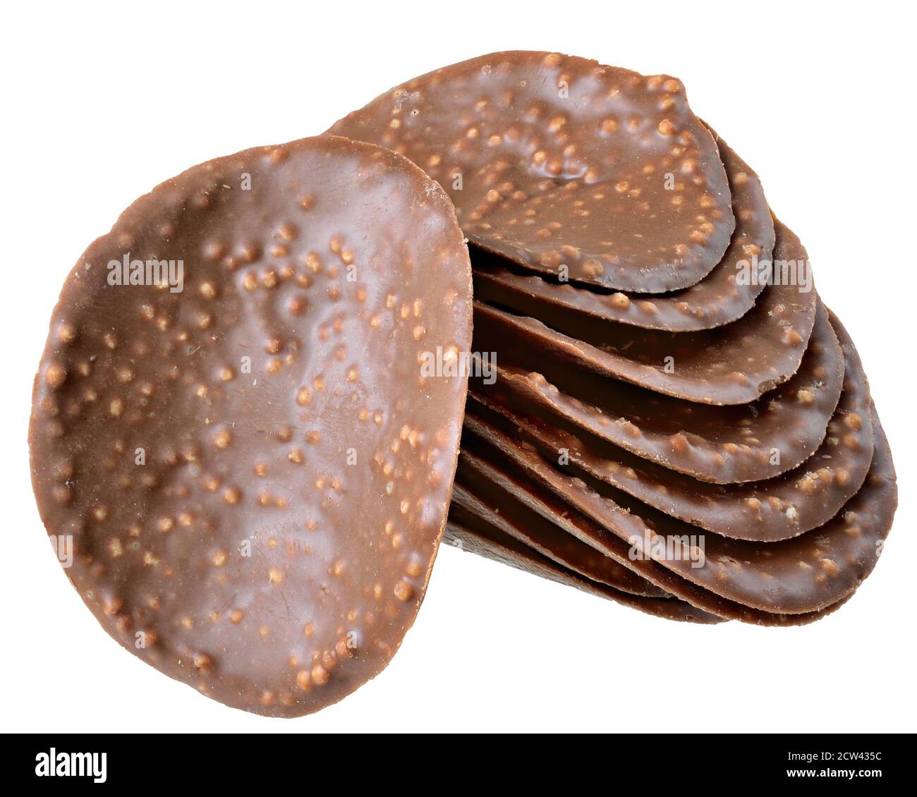 Chocolate chips close up isolated on white background Stock Photo - Alamy